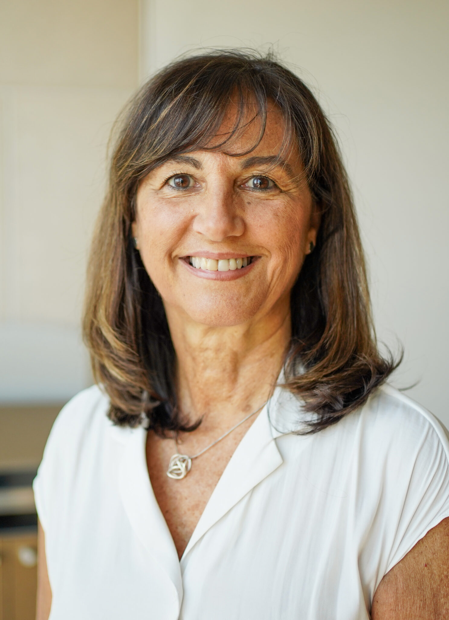 Celia Santi, MD, PhD, named the James P. Crane Professor of Obstetrics ...